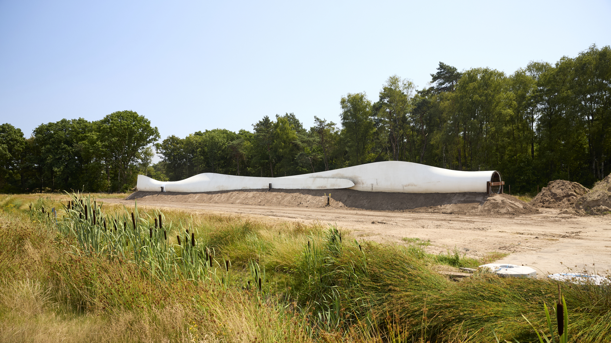 Hergebruikte windturbinebladen presteren als geluidsscherm - Afvalgids
